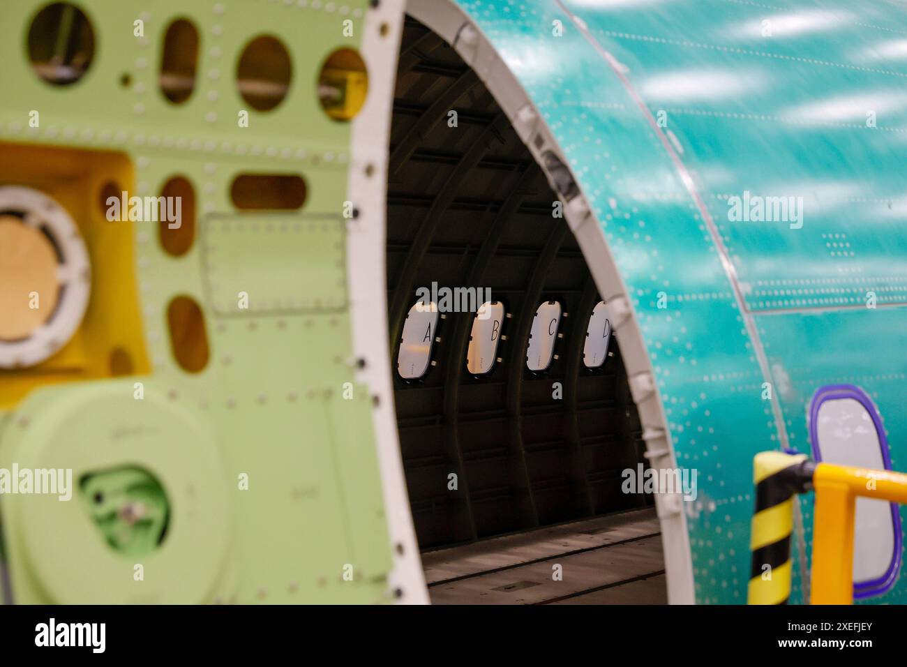 A Boeing 737 MAX aircraft is shown on the assembly line during a brief ...