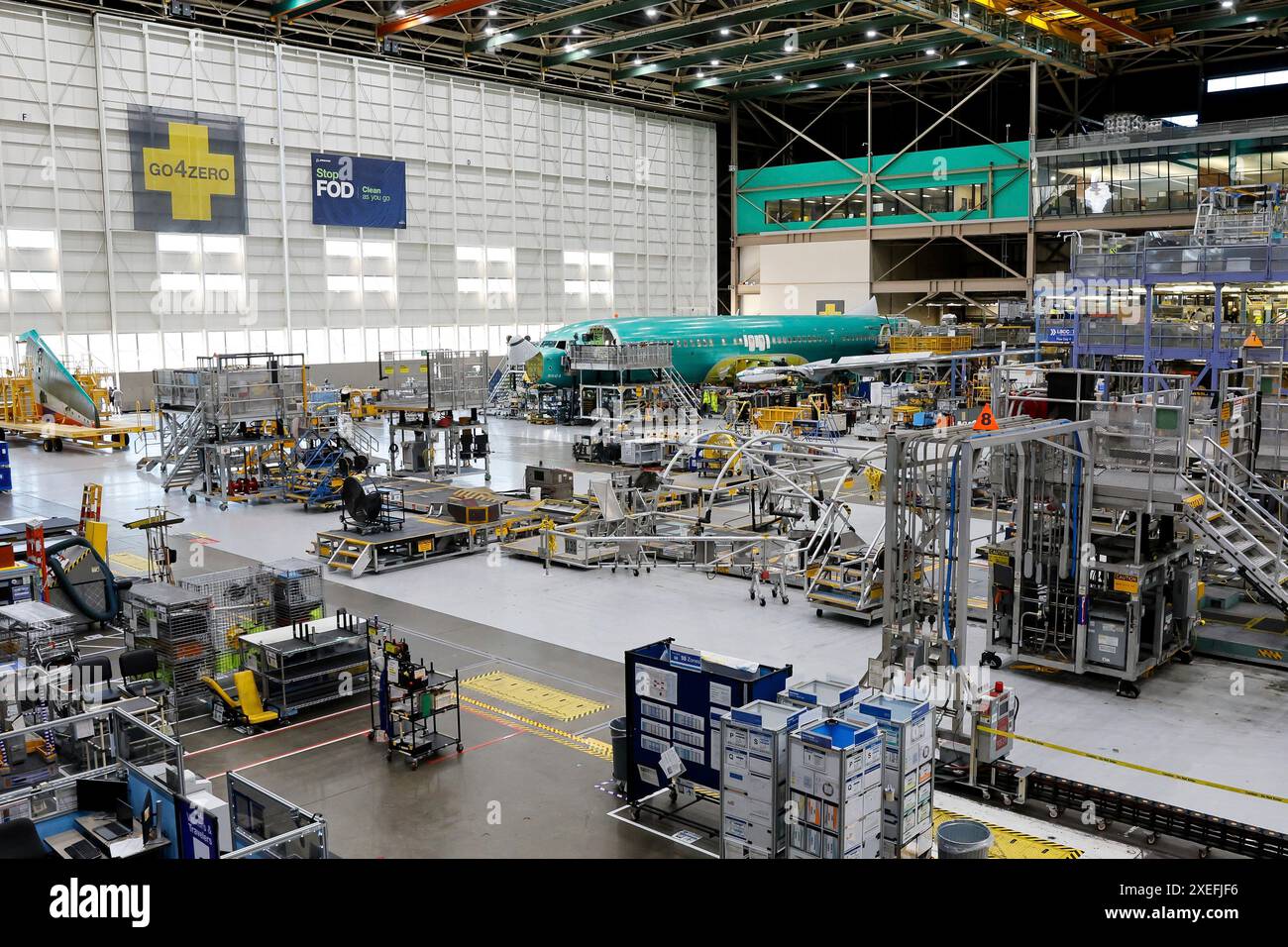 A Boeing 737 MAX aircraft is shown on the assembly line during a brief ...