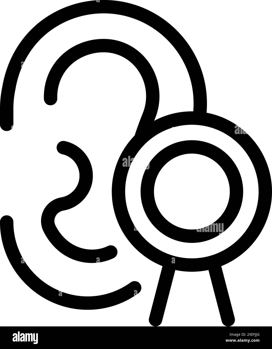 Magnifying glass is focusing on an ear, symbolizing the concept of ...