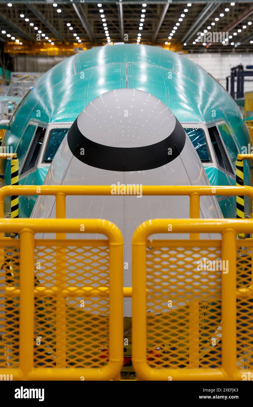 A Boeing 737 MAX aircraft is shown on the assembly line during a brief ...