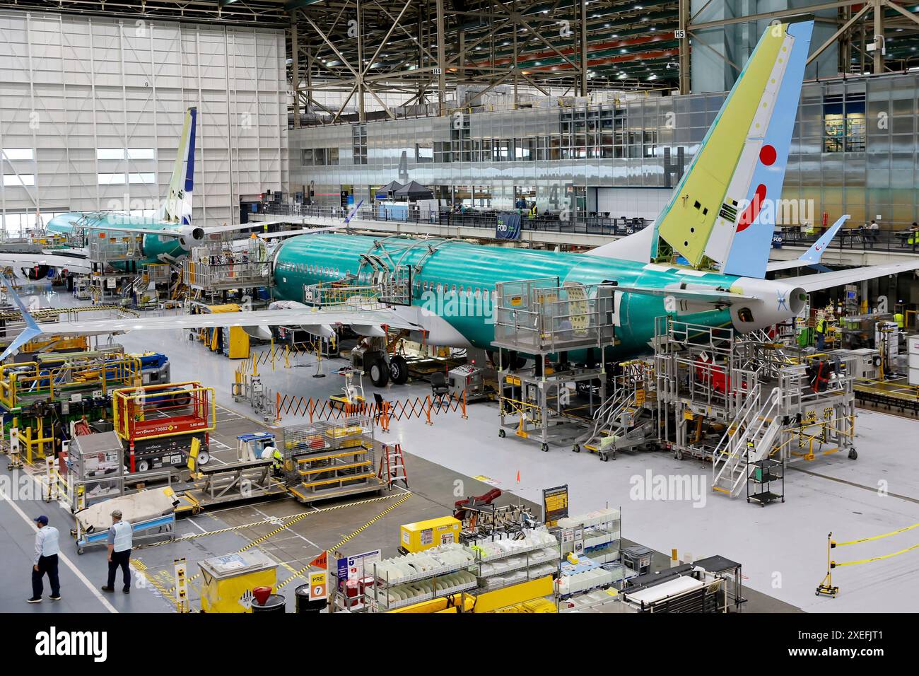 A Boeing 737 MAX aircraft is shown on the assembly line during a brief ...
