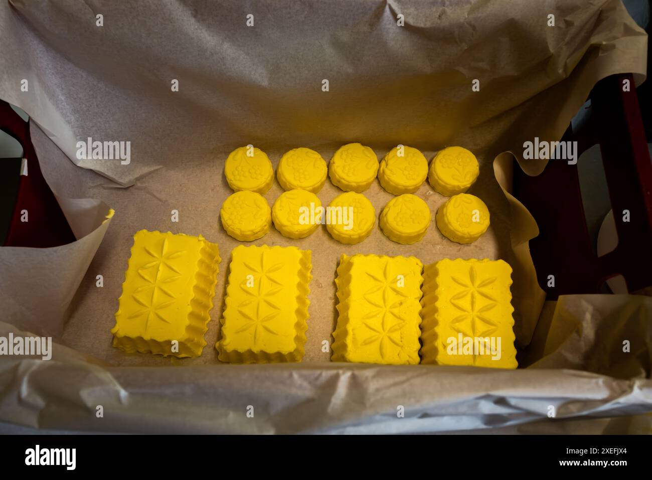 Alpine butter with traditional patterns and a golden yellow colour ...