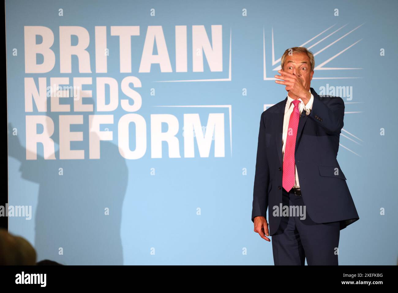 Reform UK Leader Nigel Farage speaking at a meeting in Boston, while on ...