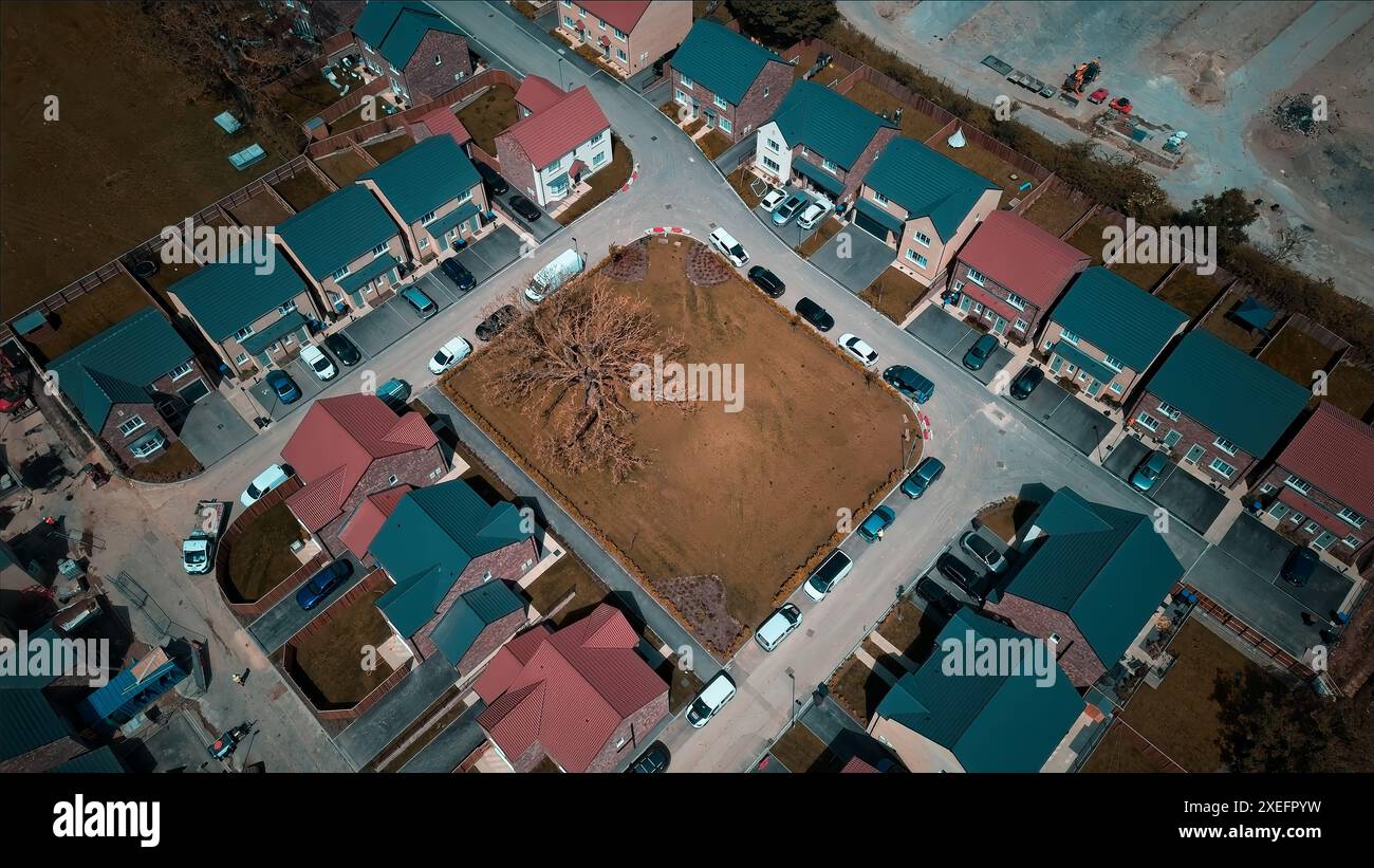 Aerial view of a residential neighborhood with houses surrounding a ...