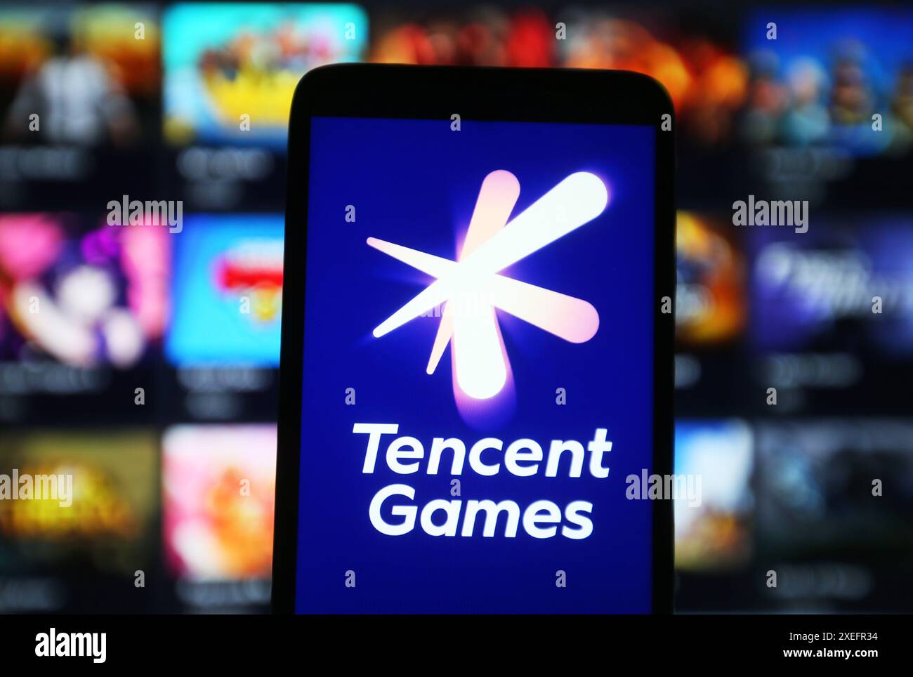 In this photo illustration, a Tencent Games logo is seen on a ...