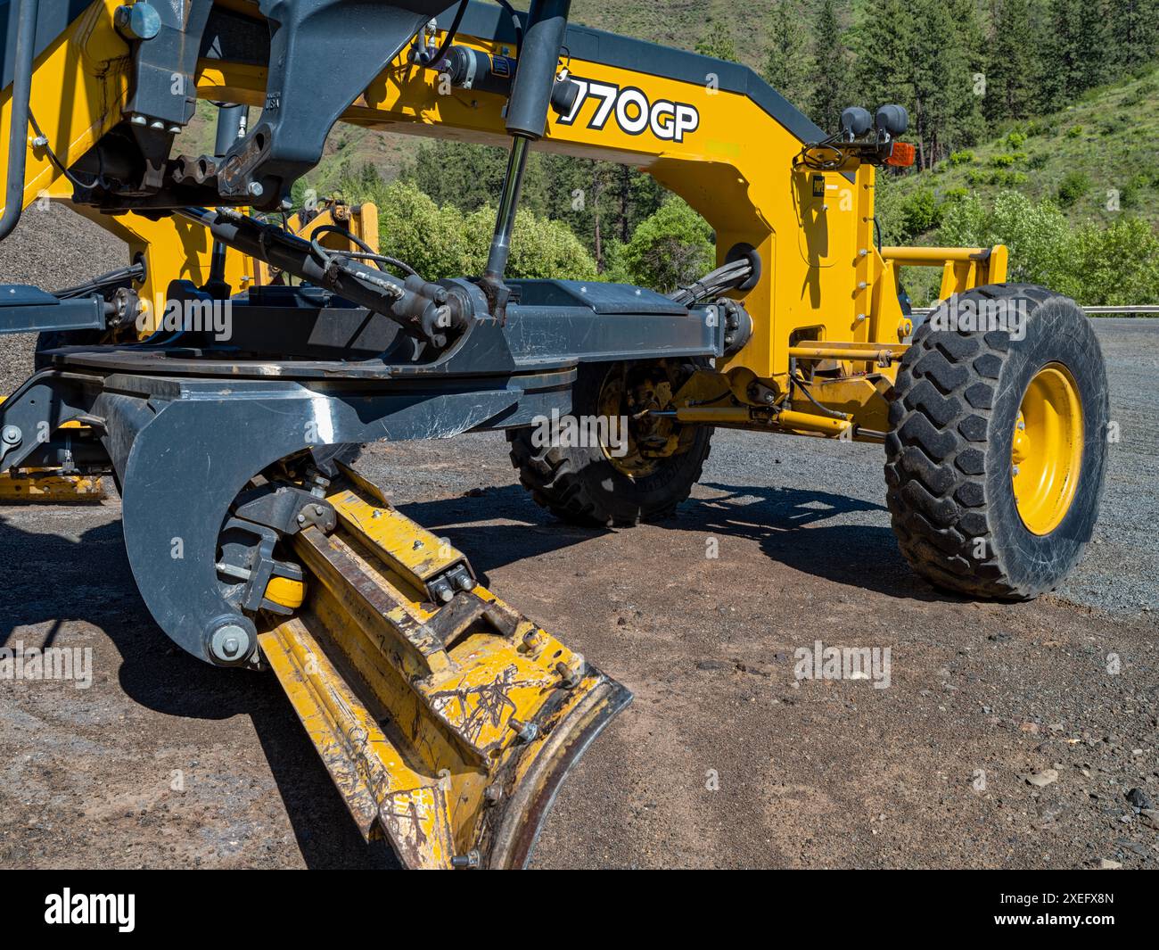The frame and moldboard at the front of a John Deere 770GP road grader ...