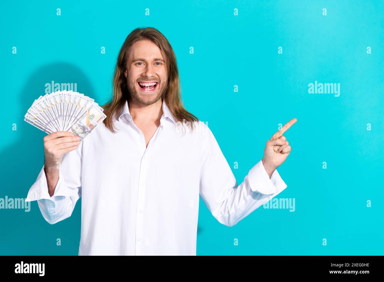 Photo of attractive funny guy wear white shirt holding money fan ...