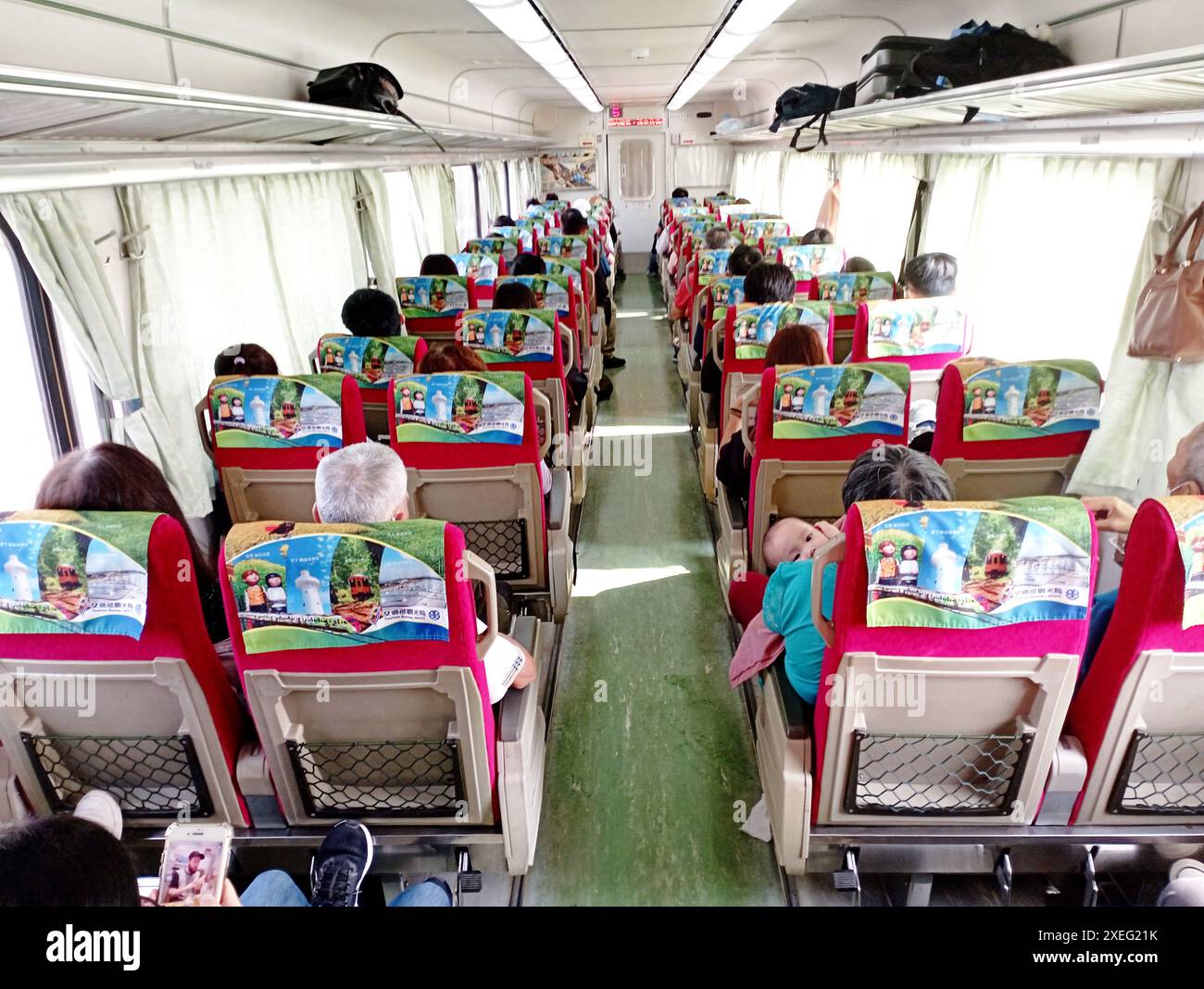 April 17, 2024, Taiwan: People ride a Taiwan Railway (TRA) train ...
