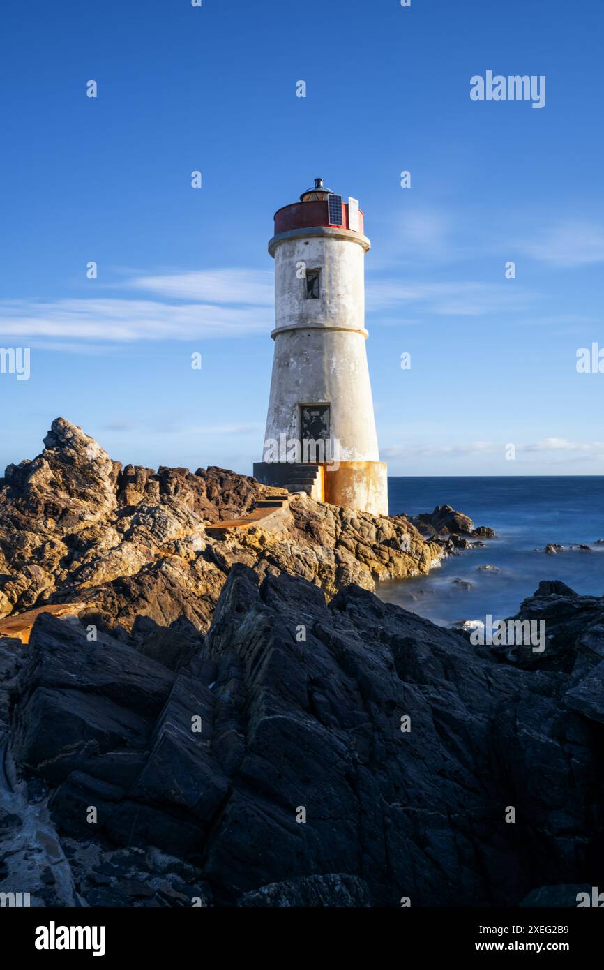 Vertical view of the old Capo Ferro Lighthouse in Sardinia Stock Photo ...