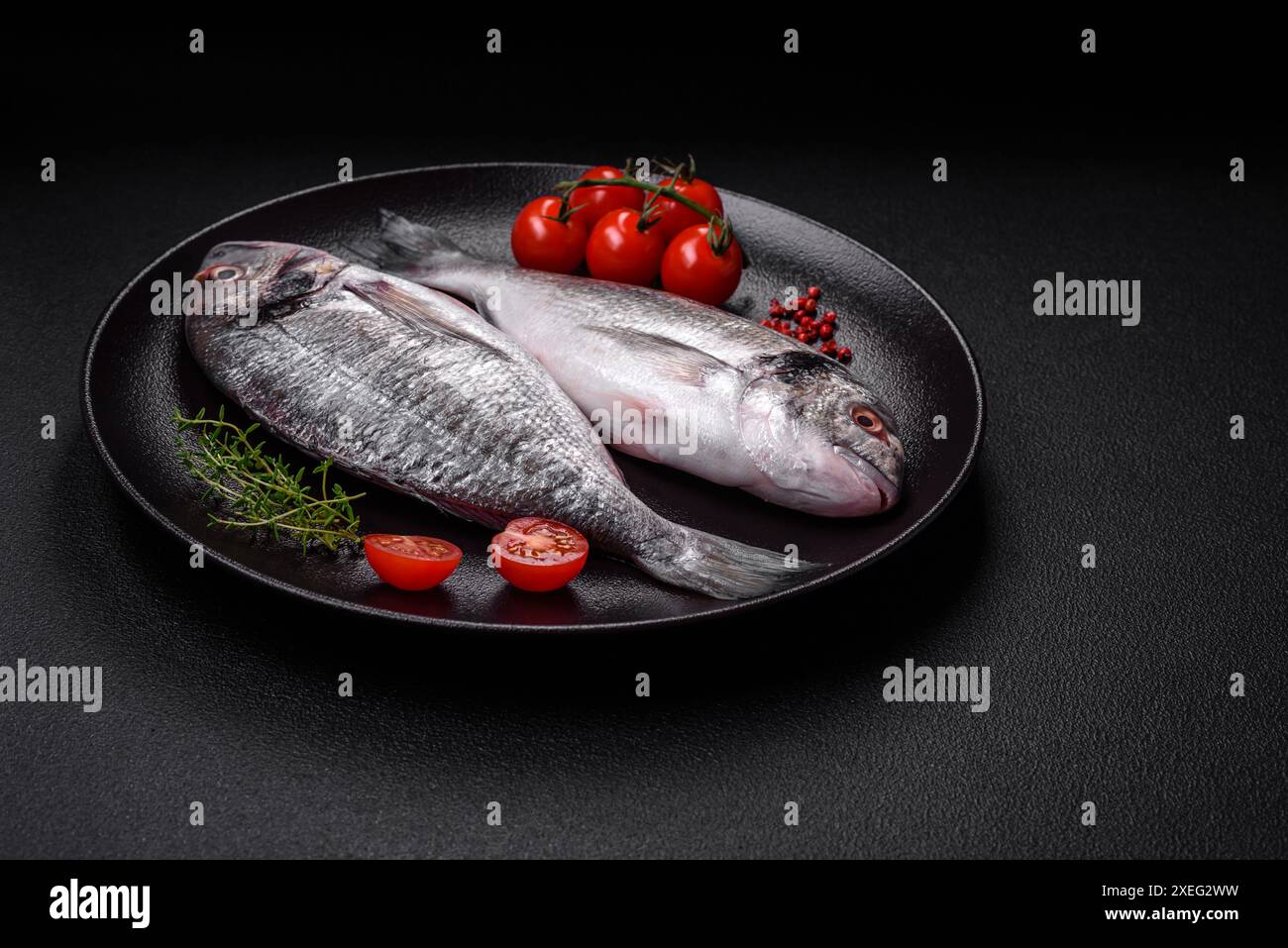 Fresh raw dorada fish with salt Stock Photo - Alamy