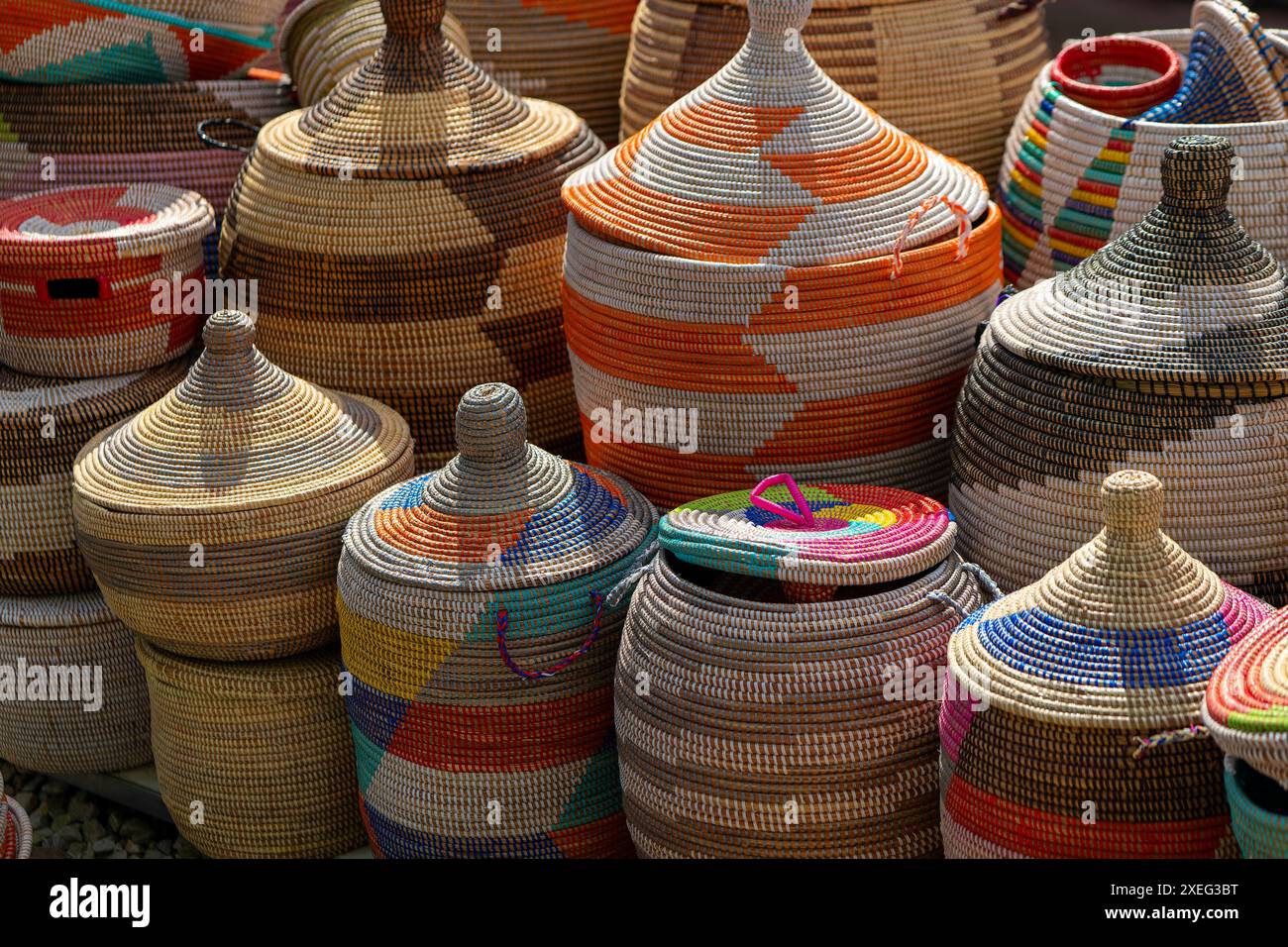 Collection of colorful baskets made of woven materials Stock Photo - Alamy