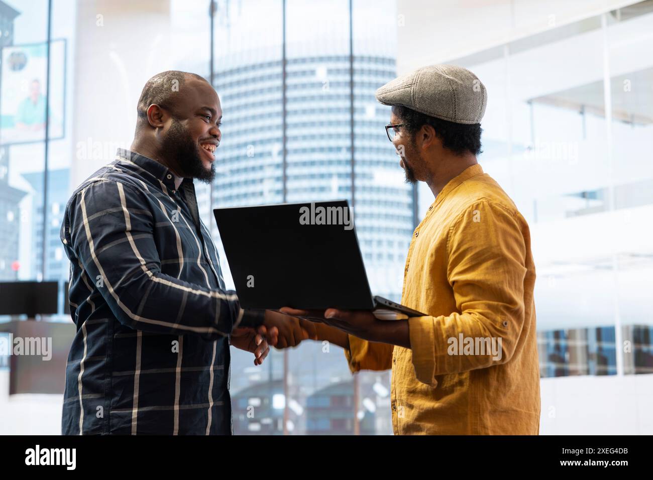 Business owner planning a property investment during office tour with ...