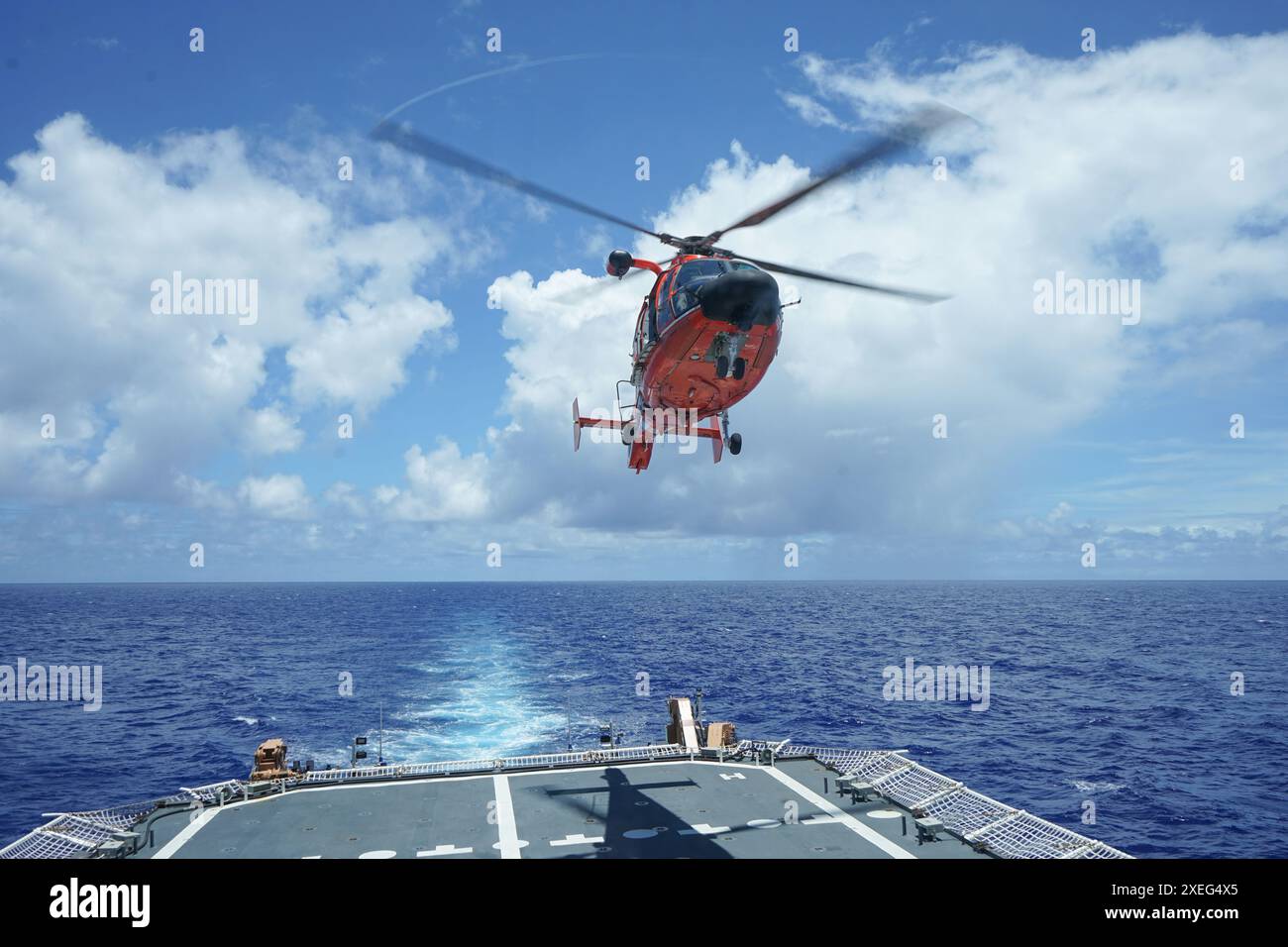 An embarked Coast Guard Helicopter Interdiction Tactical Squadron MH-65 ...