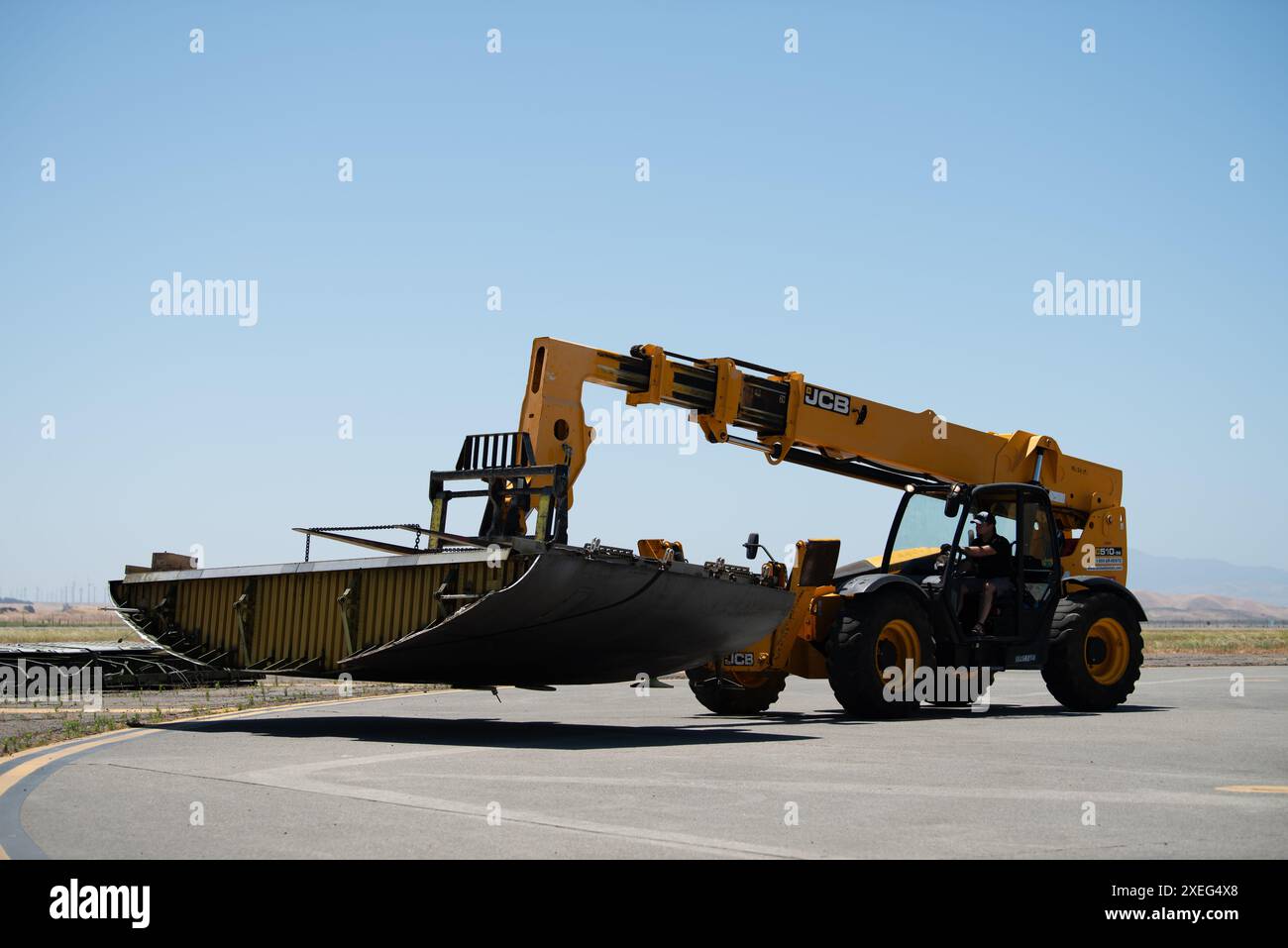 A U.S. Air Force C-5A Galaxy structure is lifted for transport on the ...