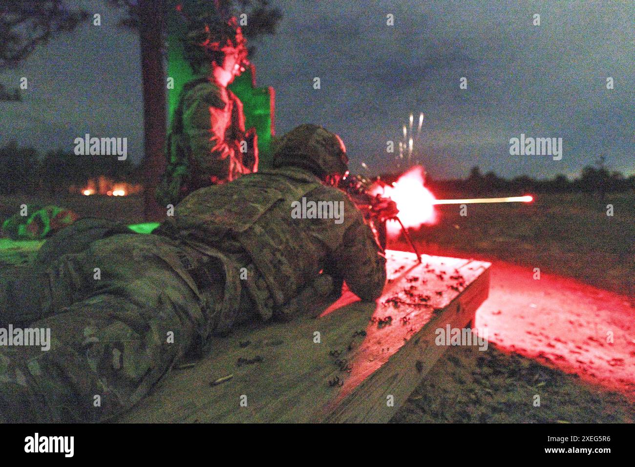 Wearing night vision gear, Sgt. Michael Fassnacht, a 68W Combat Medic ...