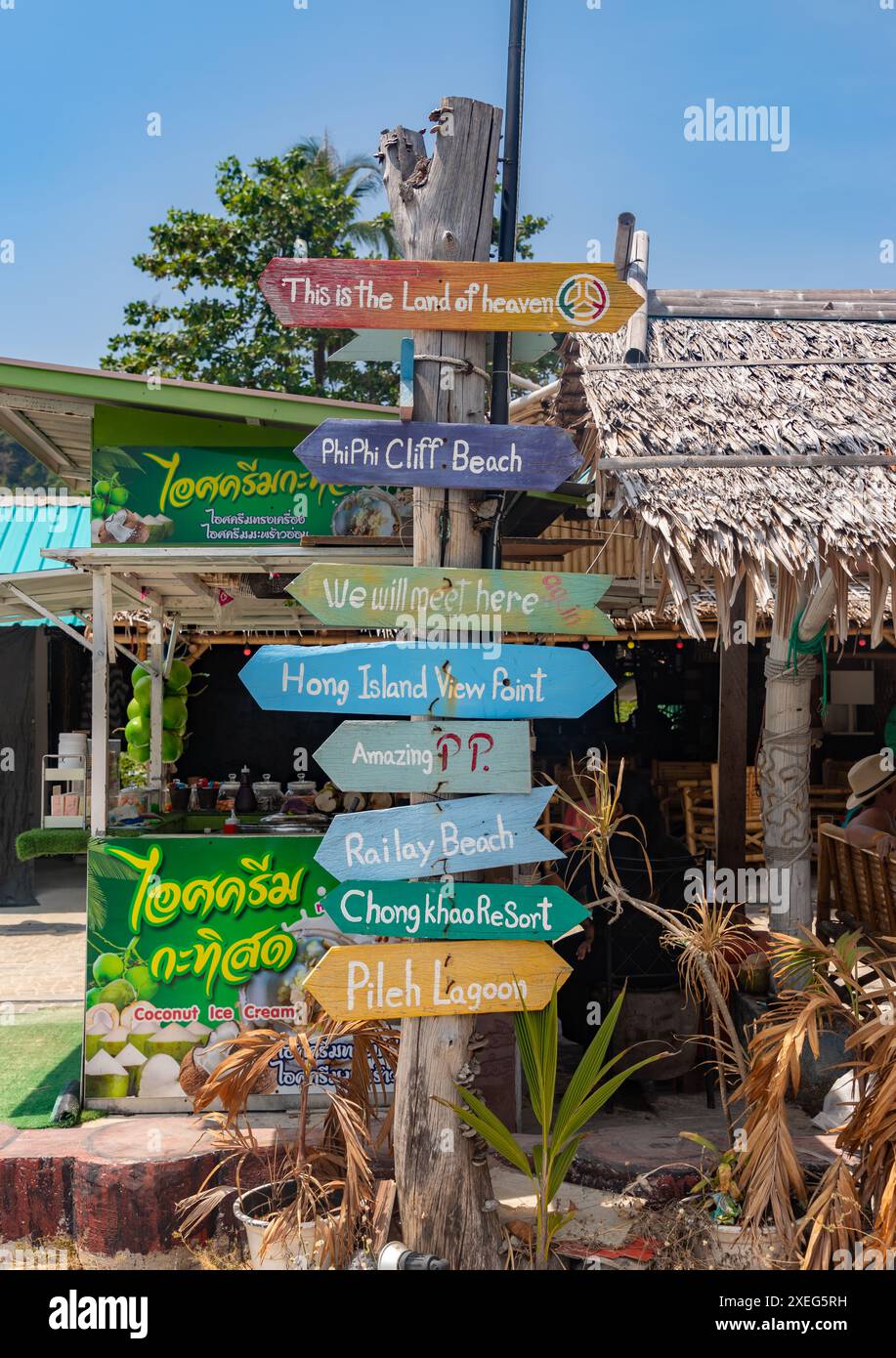 A picture of direction signs on Ton Sai Beach, at the Ko Phi Phi Don ...