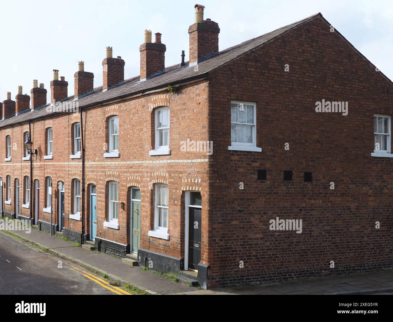 Perspective view of a street of traditional old British redbrick ...