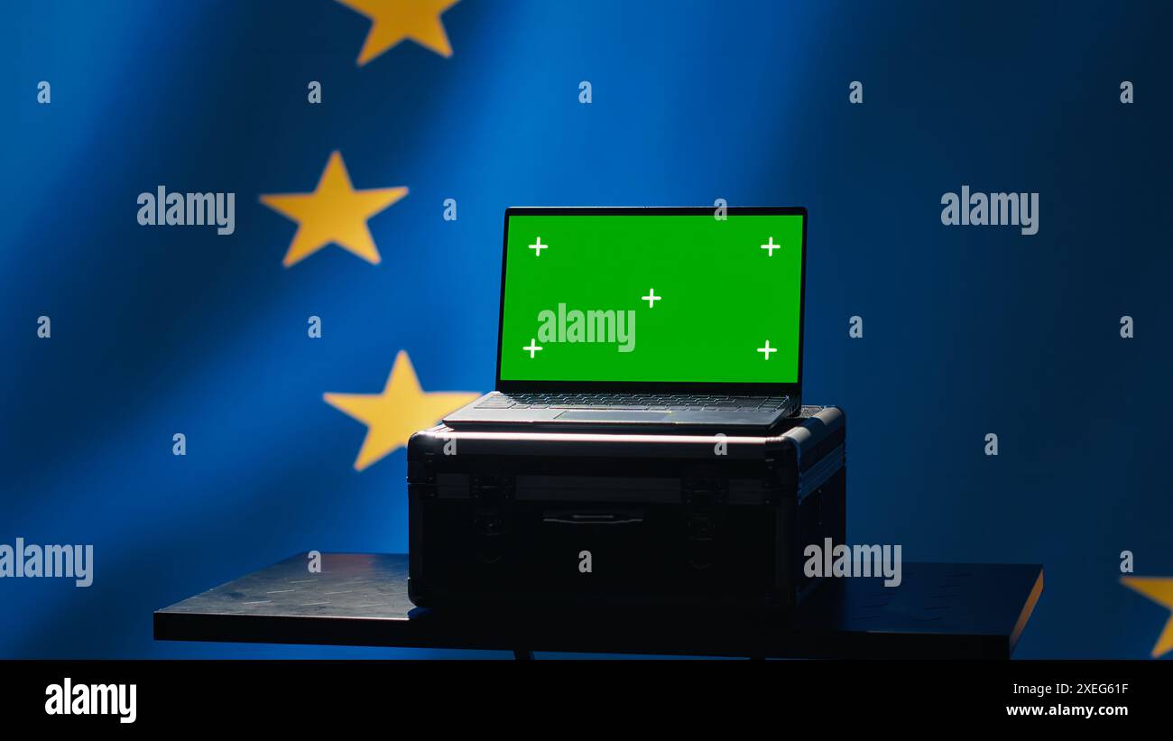 EU alliance engineer uses green screen laptop to protect against fake ...