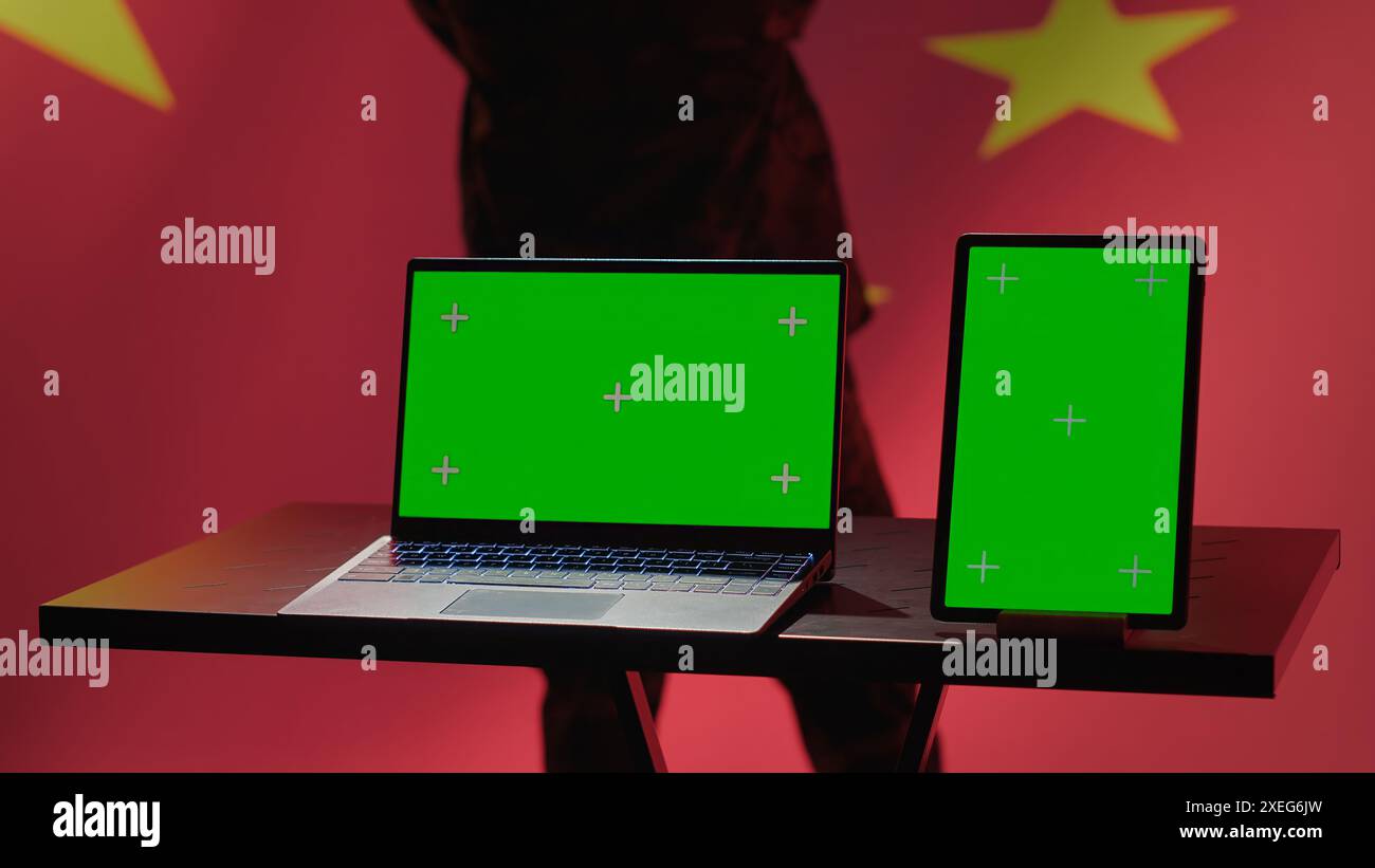 China army soldier using isolated screen laptop and tablet to identify ...