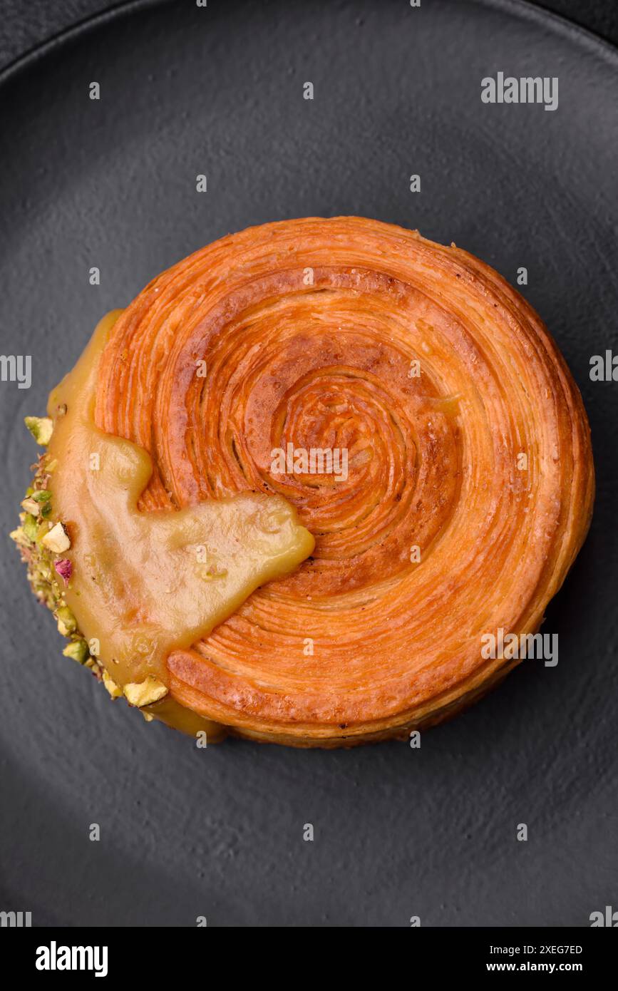 Round puff pastry croissant with raspberry filling or new york roll ...