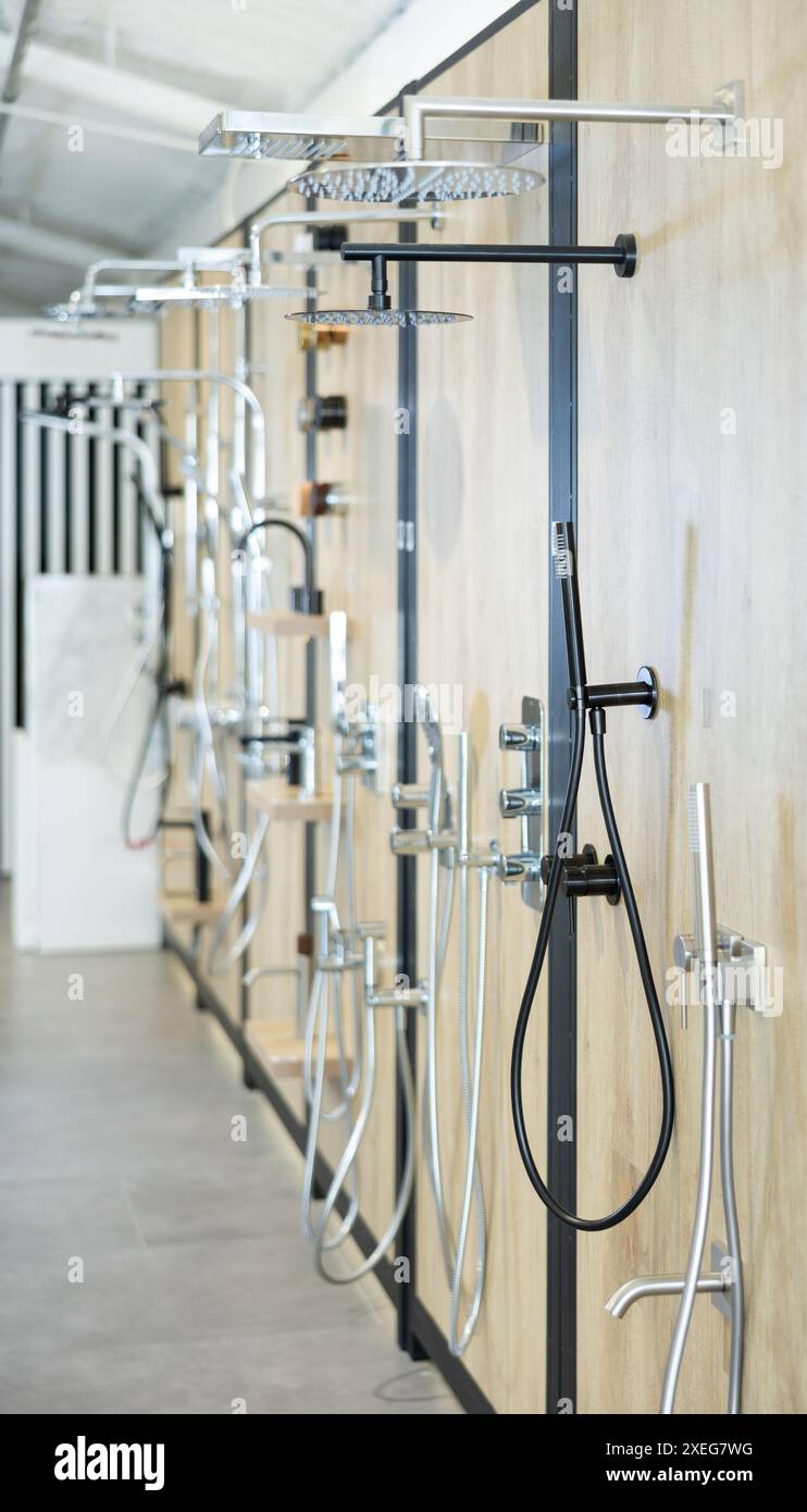 Modern showerheads and bathroom fixtures on display in home improvement ...