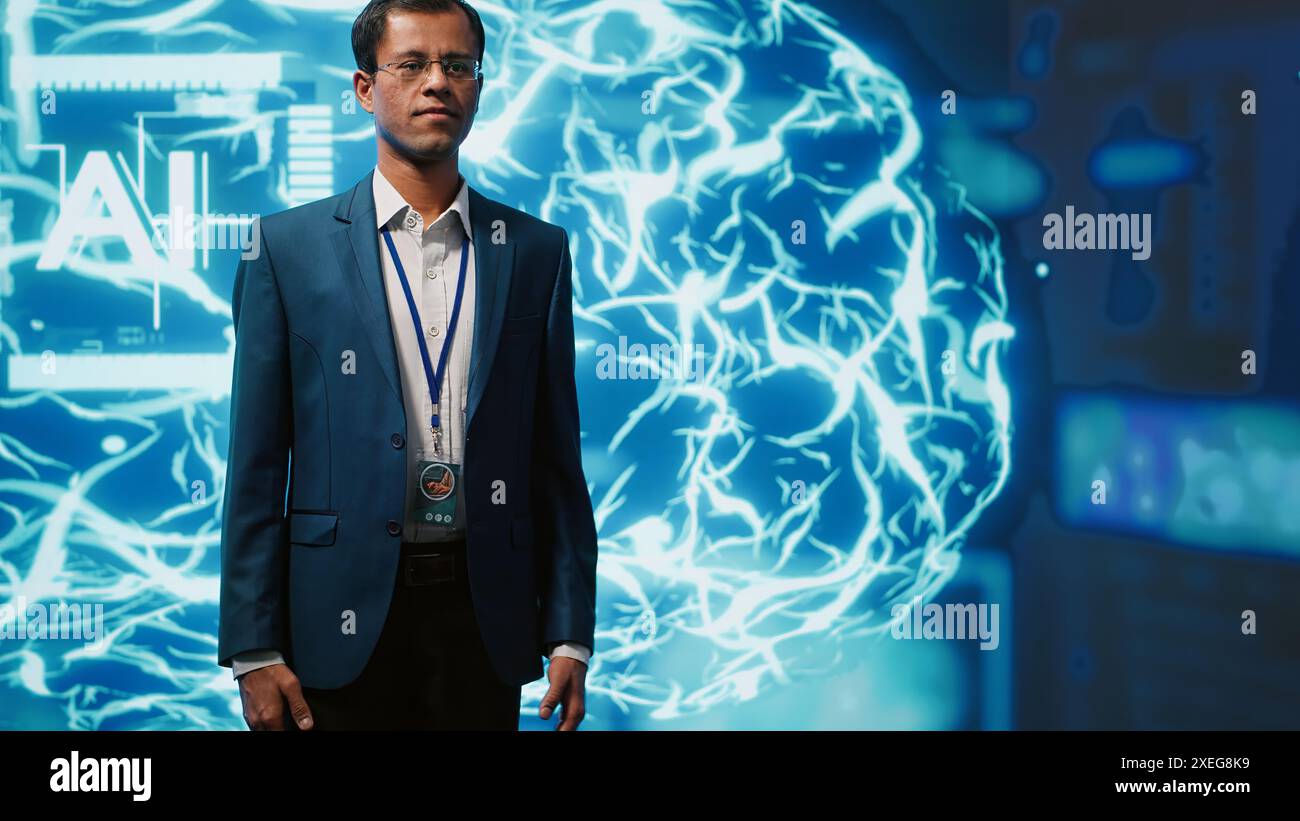 Upbeat engineer in startup doing advancements in AI field. Portrait of ...