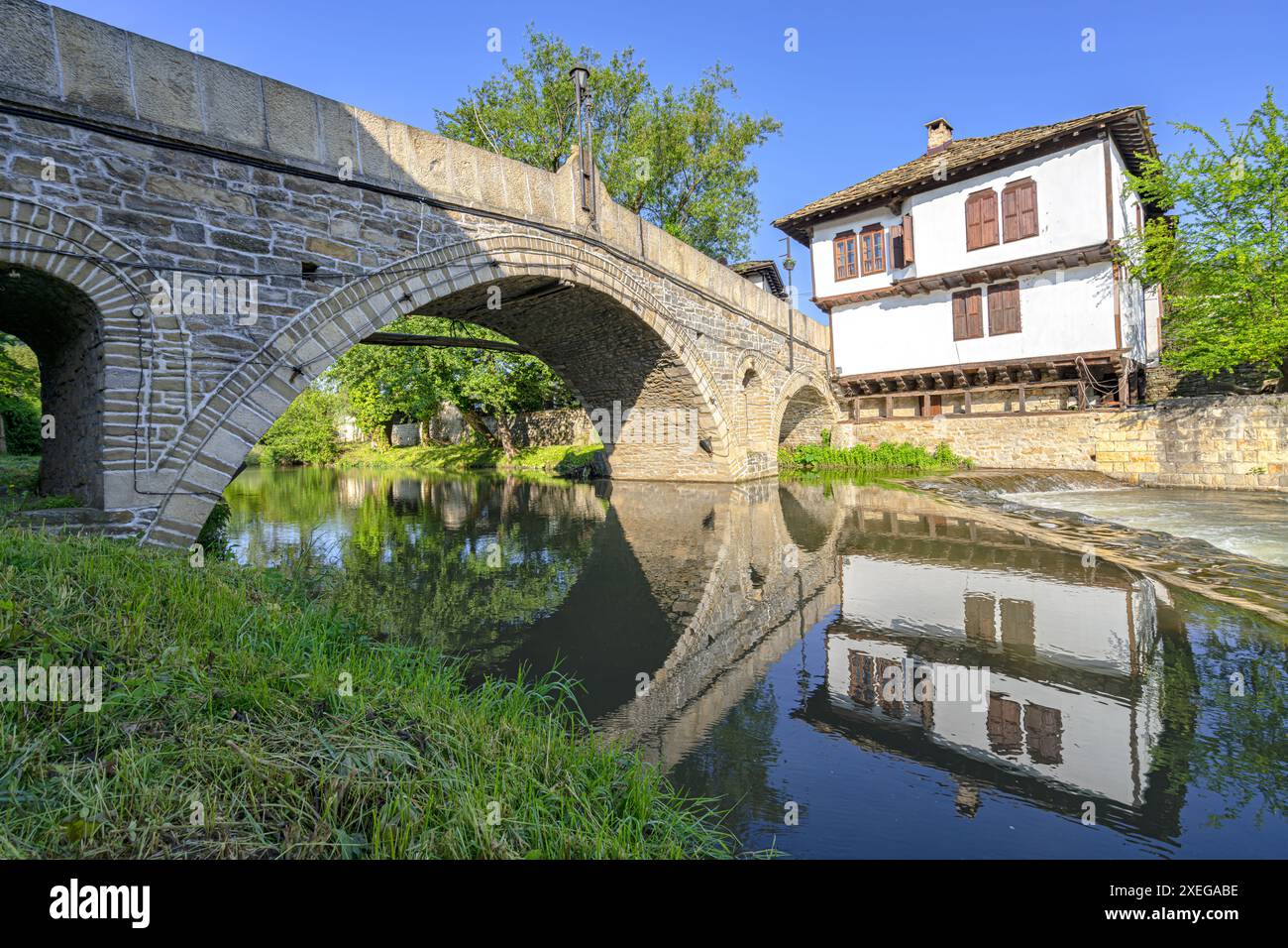 The old bridge and traditional Bulgarian houses in the old town of ...