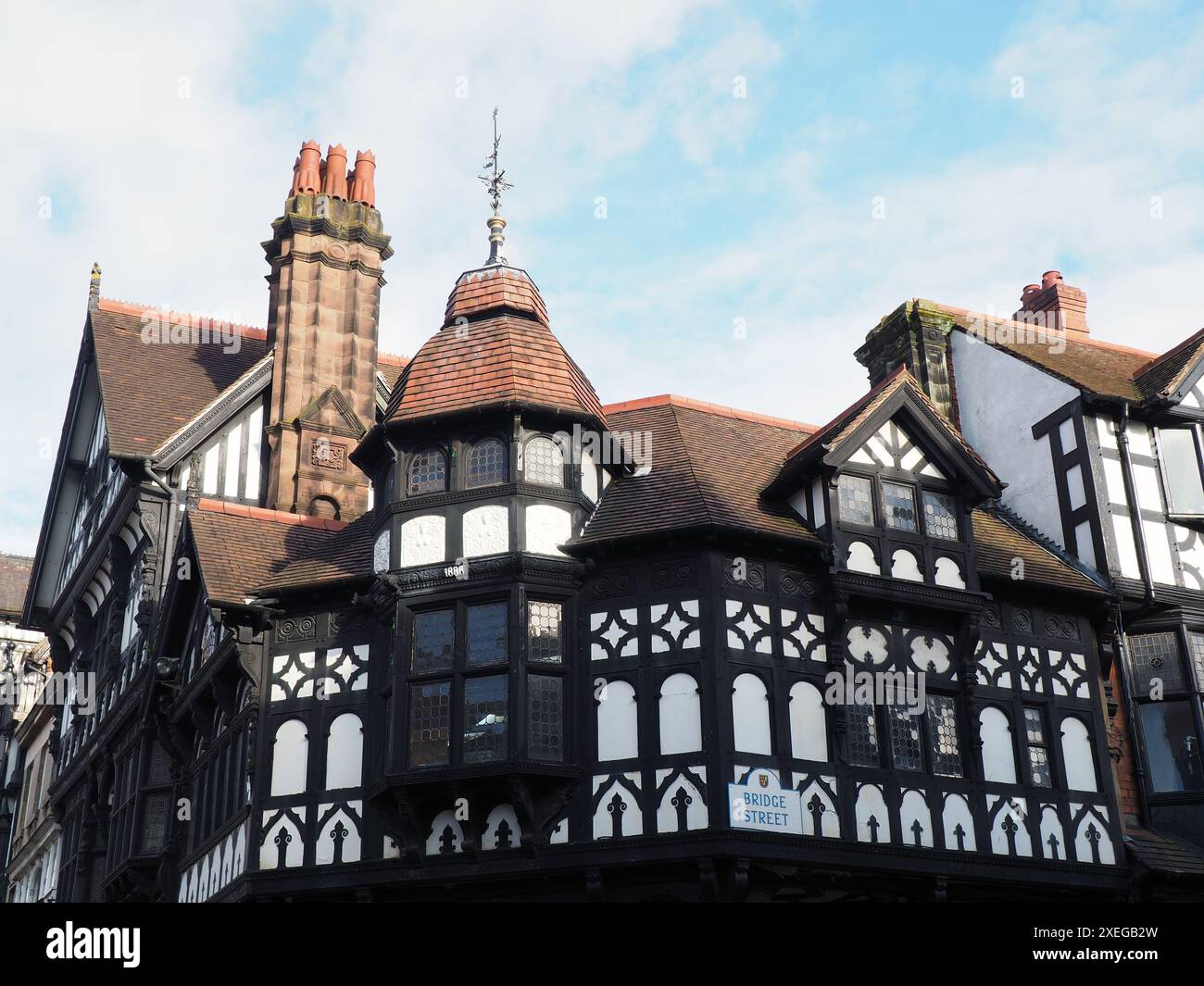 Old half timbered buildings on the corner of bridge street in Chester ...