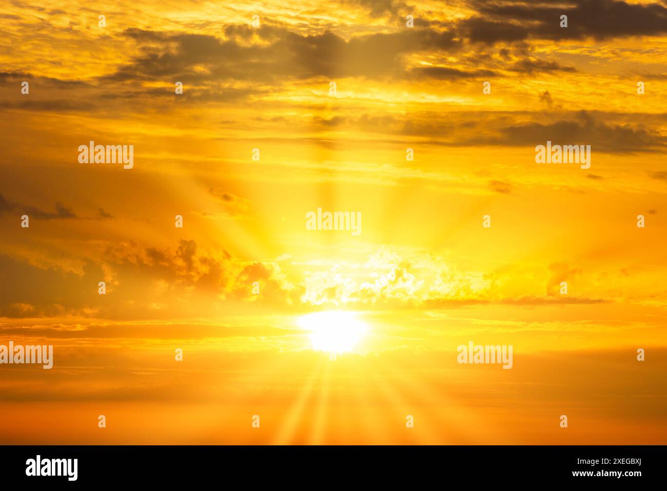 Sunset sky with sunset clouds and sun rays Stock Photo - Alamy