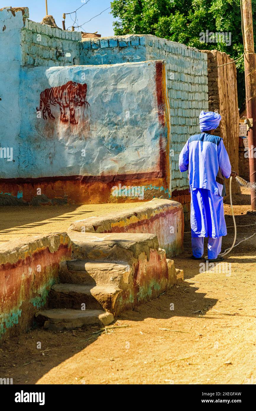 Old man walking on village hi-res stock photography and images - Alamy