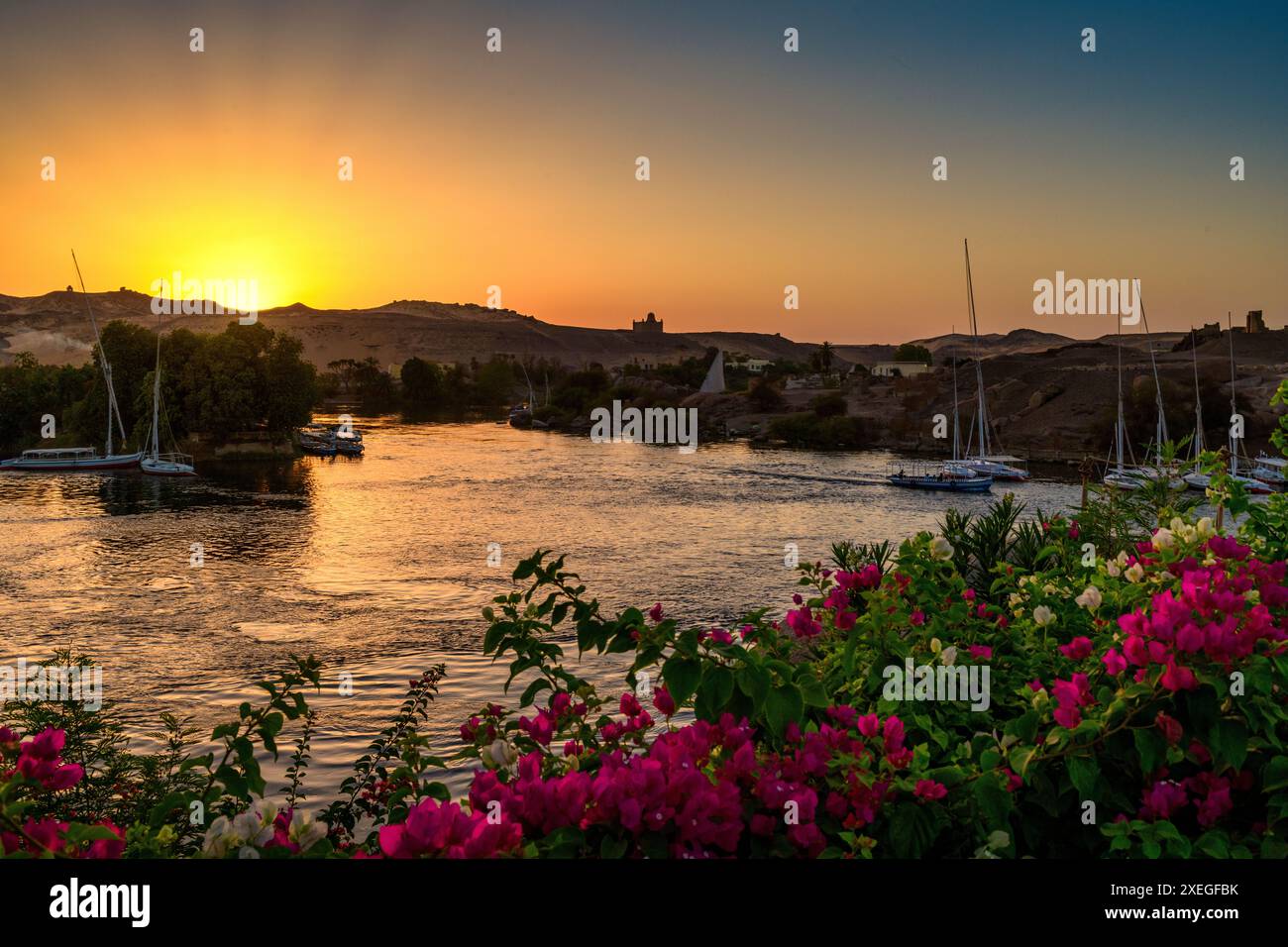 Setting Sun over the Nile River in Aswan Stock Photo - Alamy