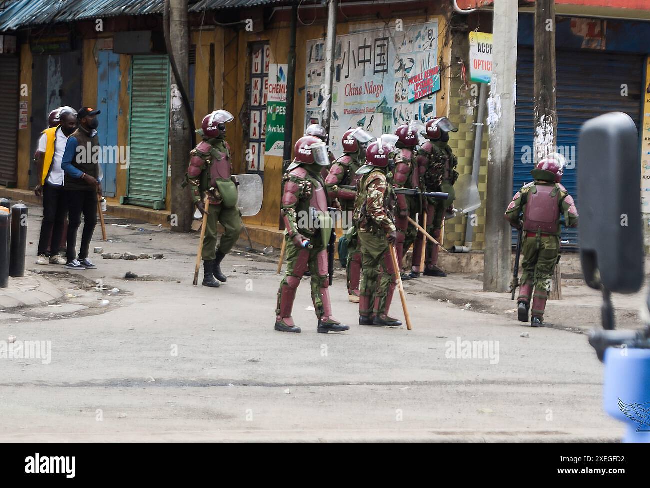 Nairobi, Kenya. 27th June, 2024. Riot police patrol the streets during ...