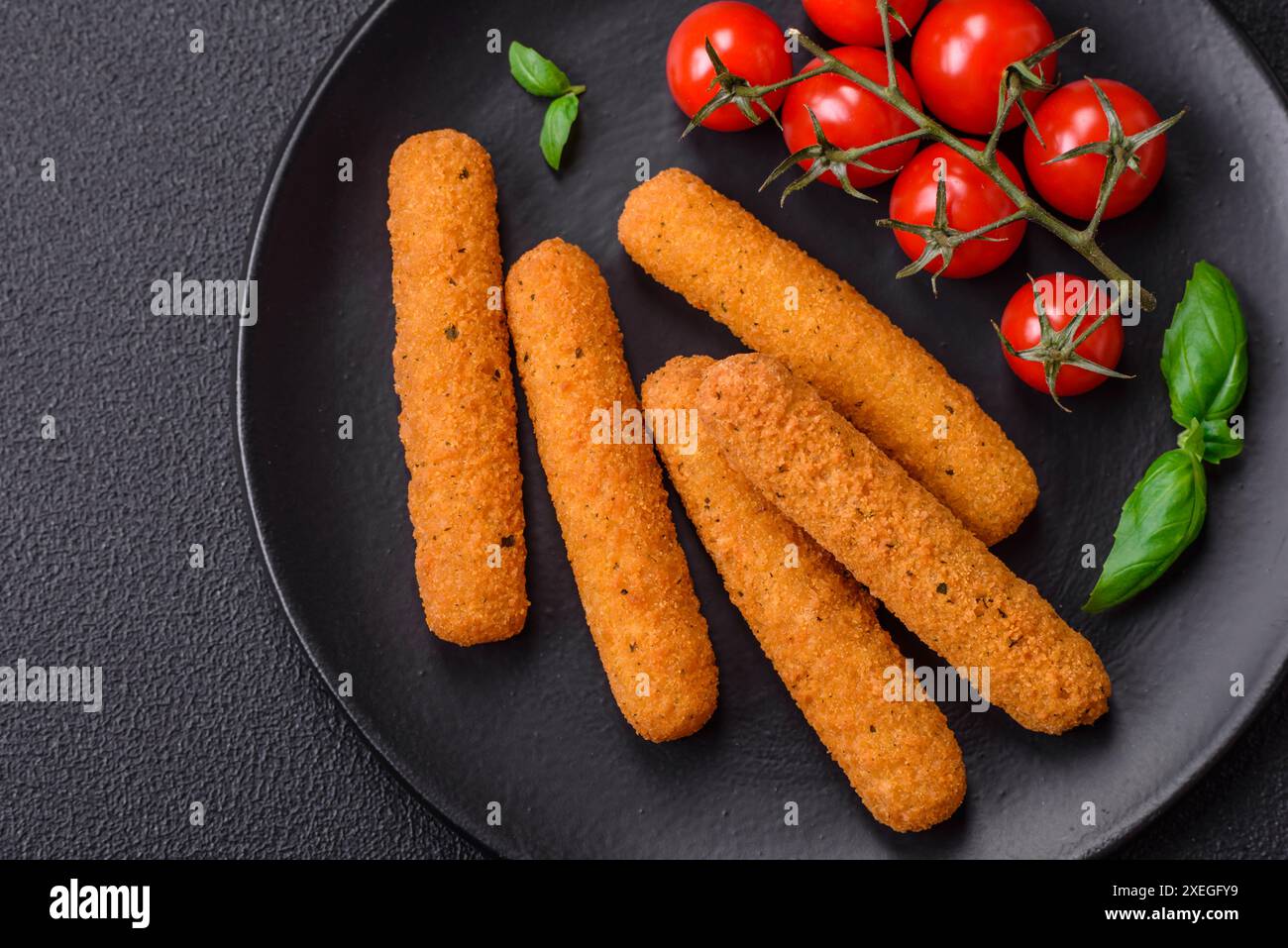 Delicious crispy cheese sticks with mozzarella, salt and spices ...