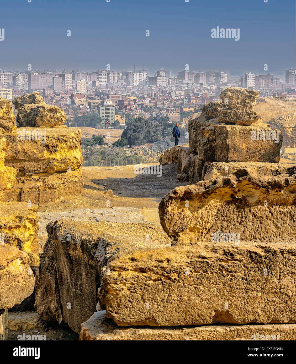 Tourist walking around the mortuary temple of Menkaure at the Giza ...