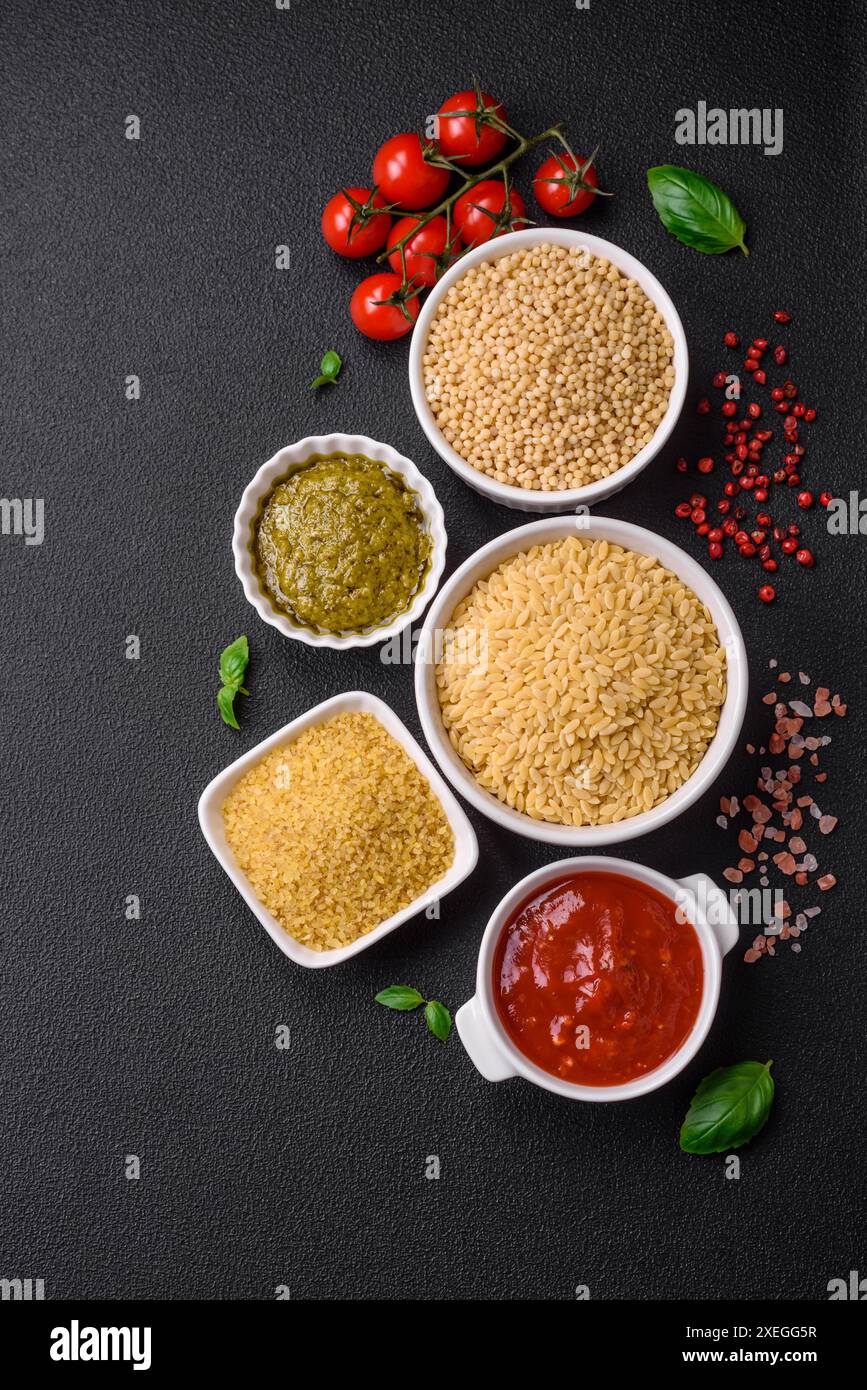 Raw whole grain orzo pasta as an ingredient for a delicious dish Stock ...