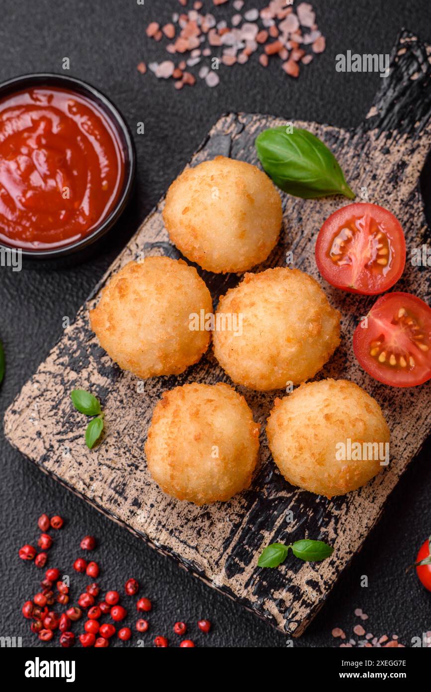 Delicious round balls of mozzarella and parmesan cheese with salt and ...