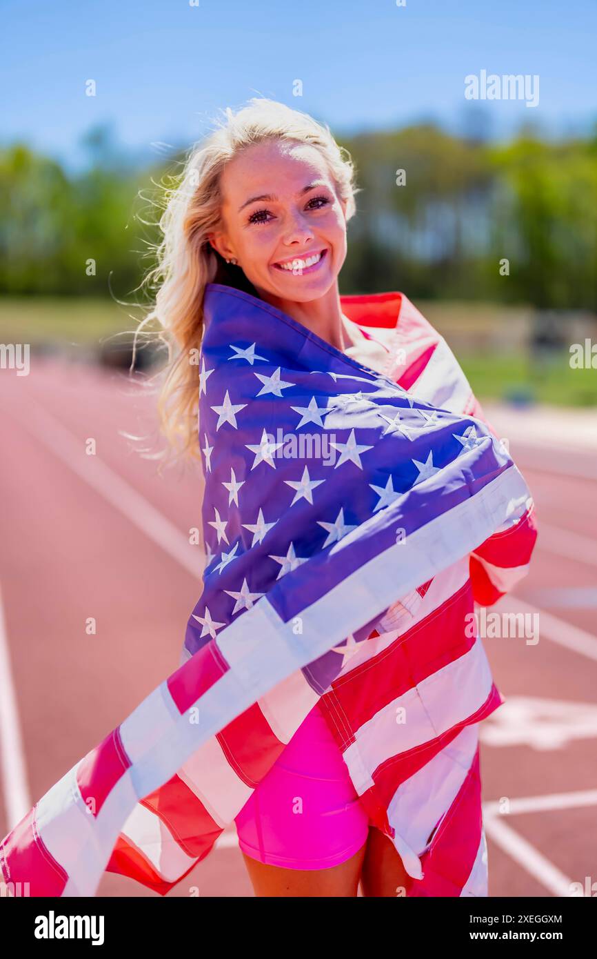 Symbol of Triumph: Proud American Athlete Honors Nation with Flag ...