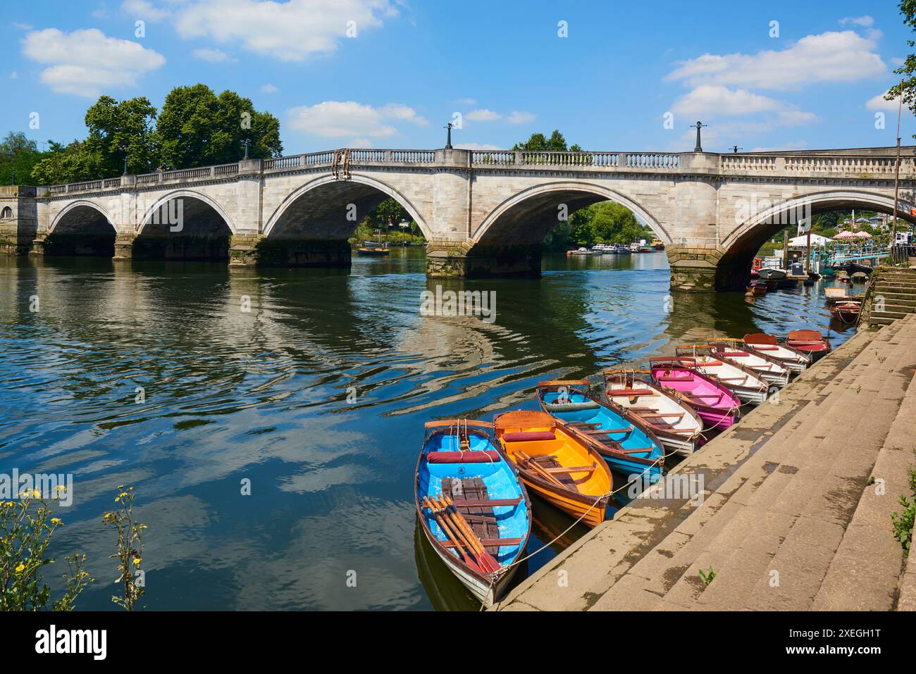 The Grade I listed Richmond Bridge, and the River Thames in summertime ...