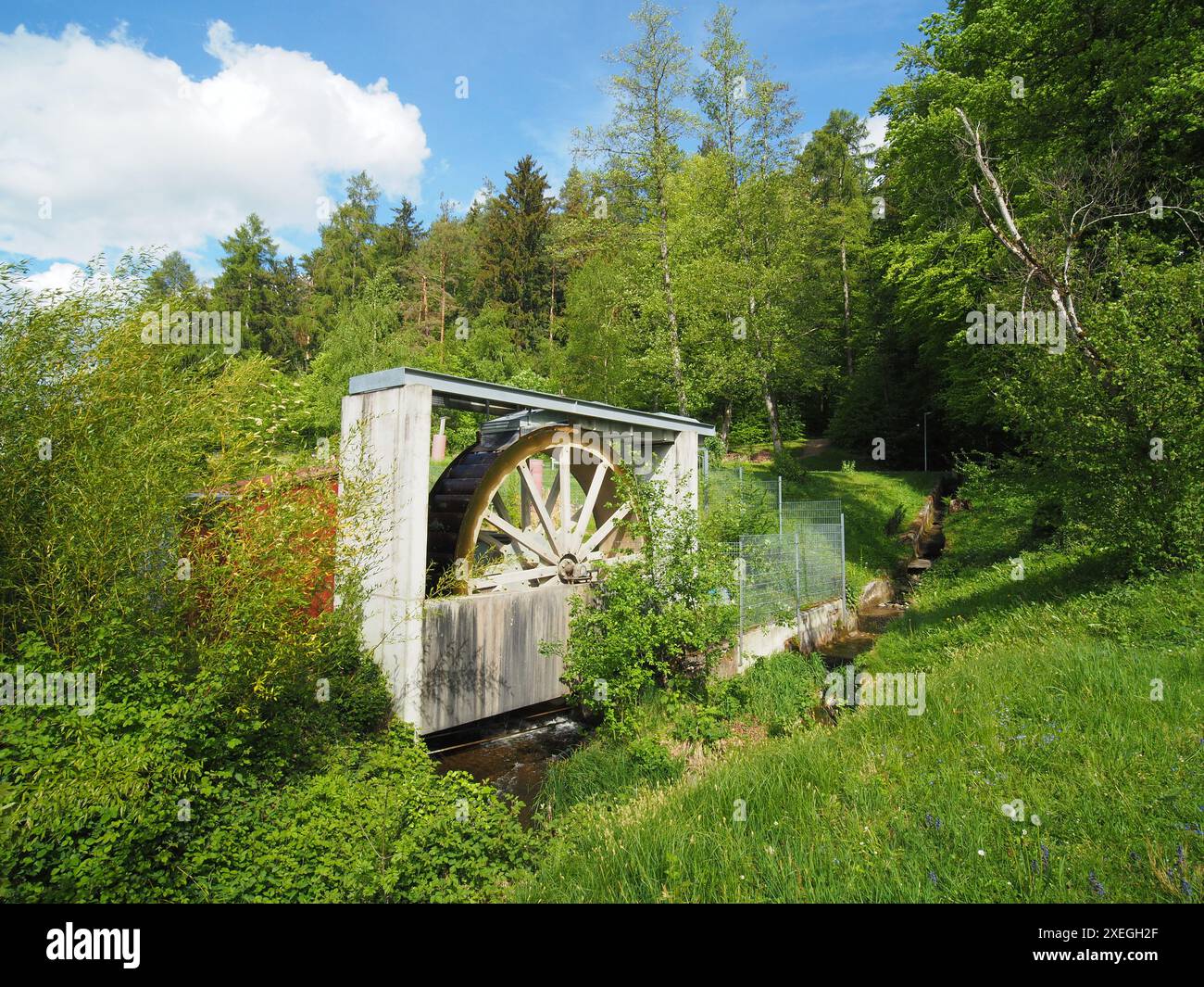 Water wheel for generating electricity Stock Photo - Alamy