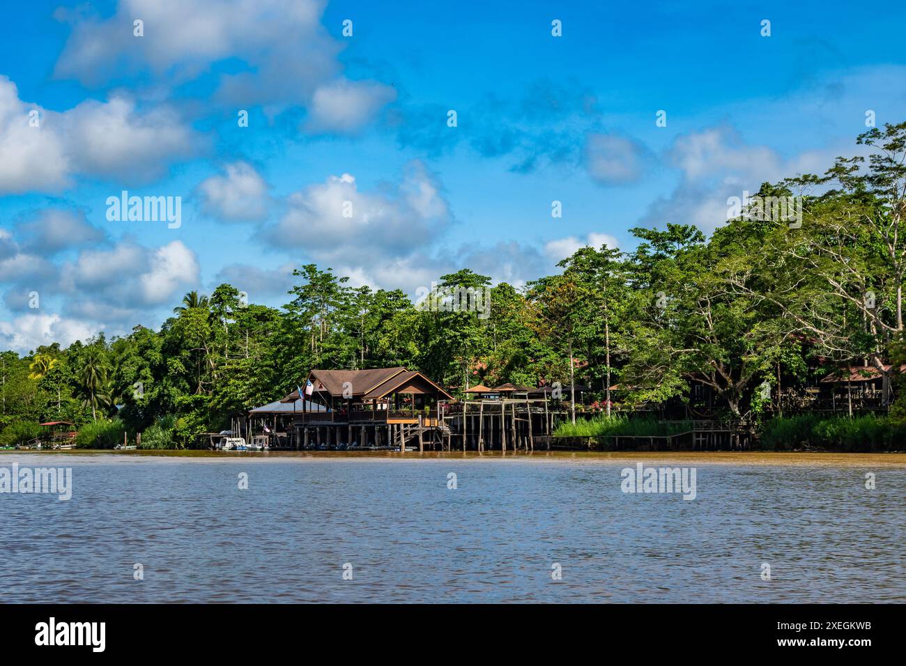 Eco-lodge on the bank of Kinabatangan River. Sabah, Borneo, Malaysia ...