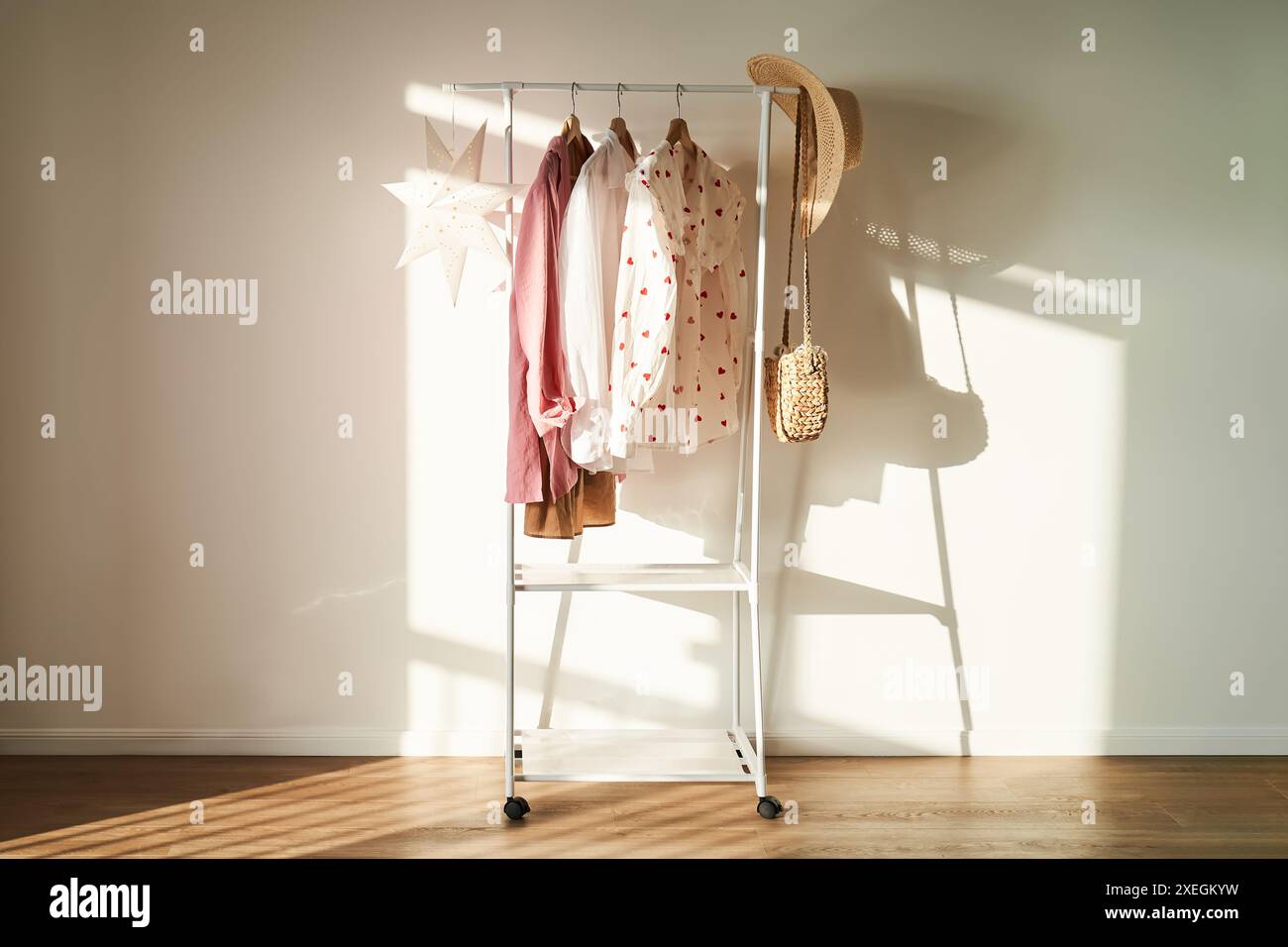 Rack hangers clothes in rays hi-res stock photography and images - Alamy
