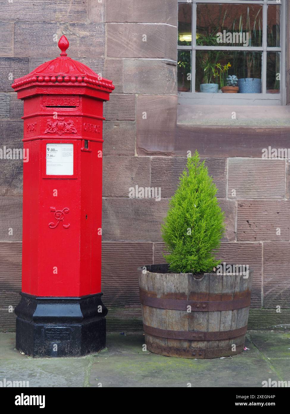 Traditional bright red cast iron British Victorian octagonal post or ...