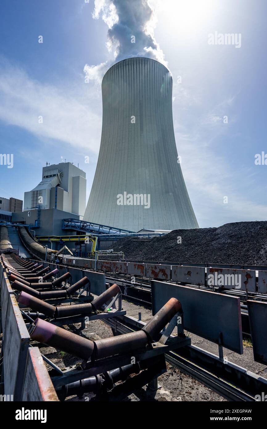 Coal conveyor belt and cooling tower in a coal-fired power plant Stock ...
