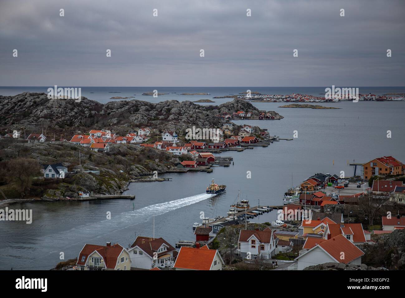 Typical Scandinavian village, coastal strip in a bay fishing village in ...