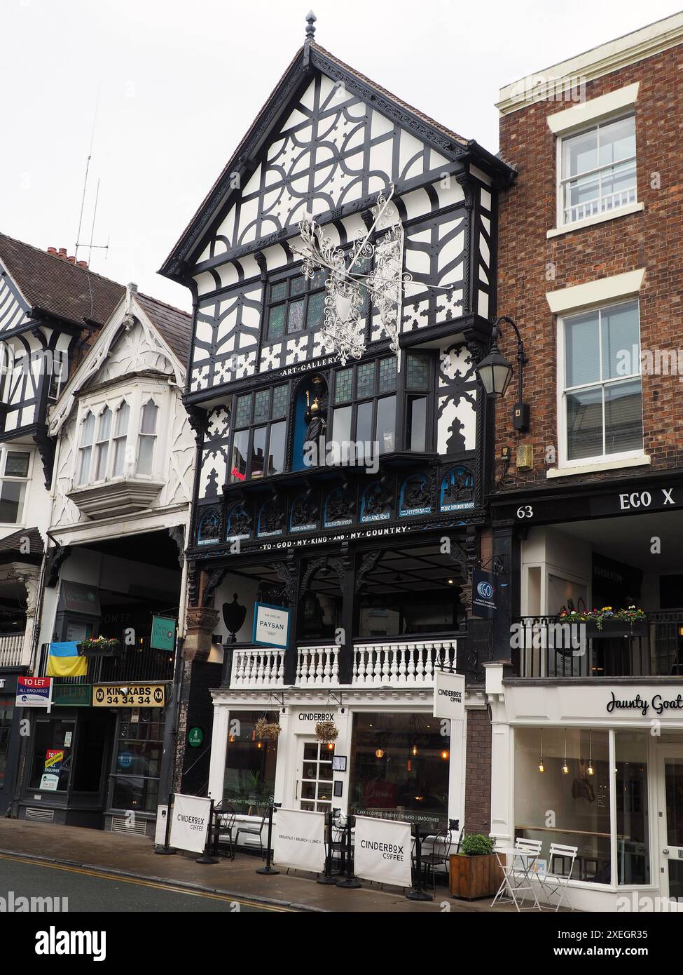 Old half timbered building with cinderbox cafe in Bridge street Chester ...