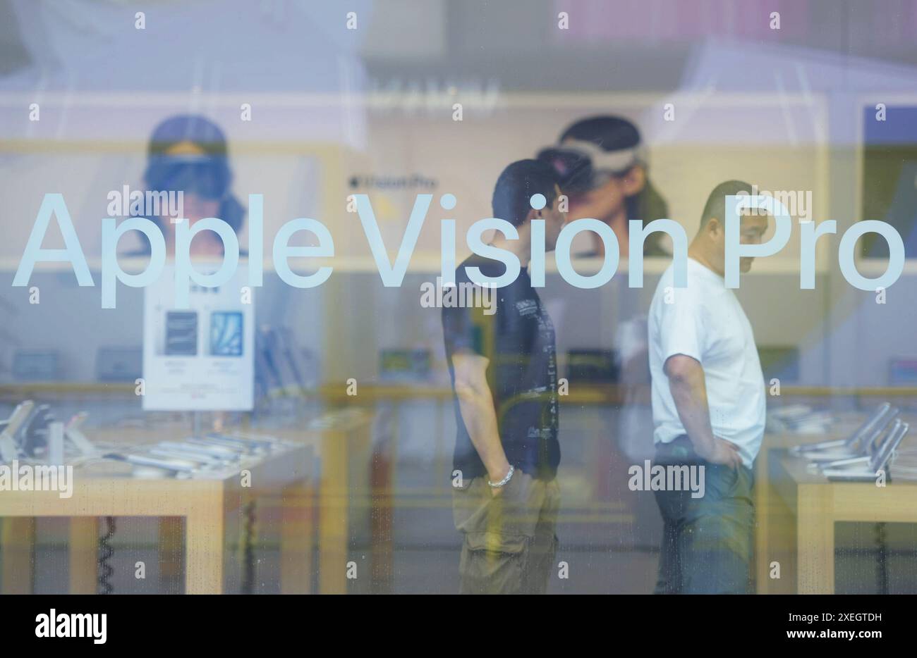 HANGZHOU, CHINA - JUNE 28, 2024 - Customers experience the Apple Vision ...