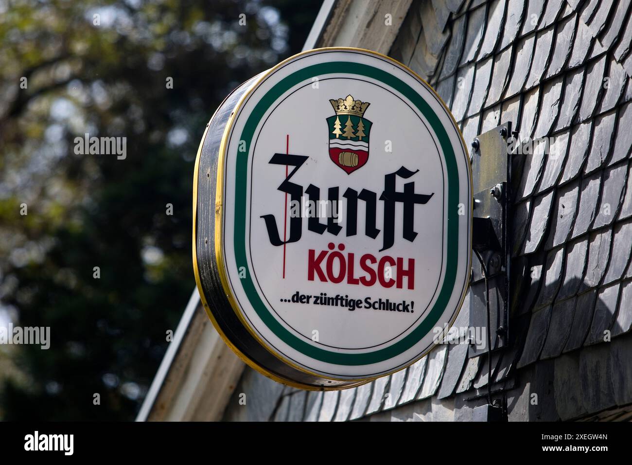 Advertising sign for Zunft Koelsch at the train station building in ...