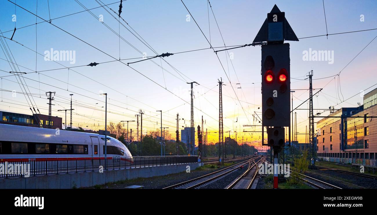 Intercity Express at the atmospheric sunrise at the main train station ...