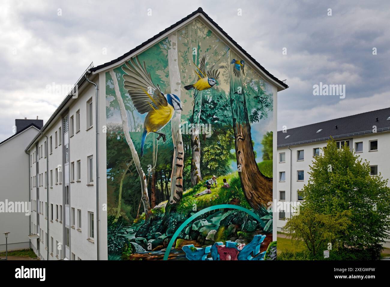 Artistic facade design on a block of flats, street art, graffiti artist ...