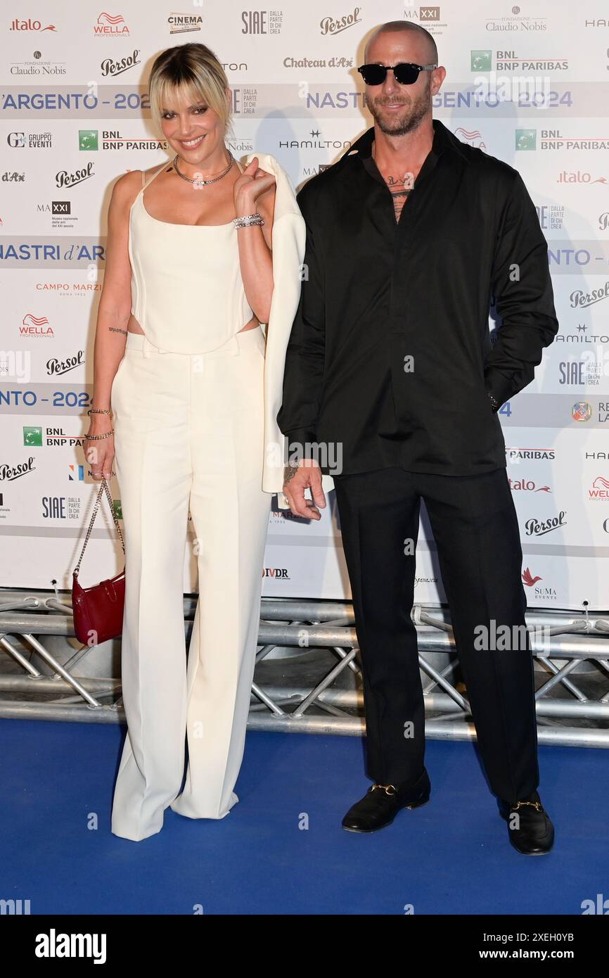 Micaela Ramazzotti (l) and Claudio Pallitto (r) attend the blu carpet ...